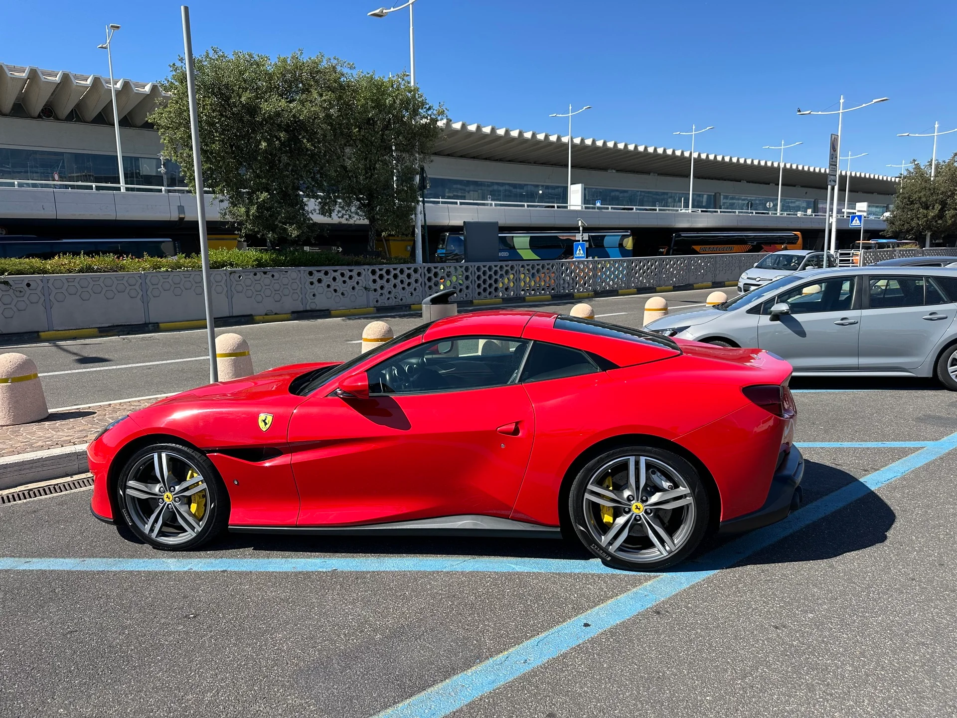 Delivery of a Ferrari Portofino at Fiumicino Airport with drop-off in ...